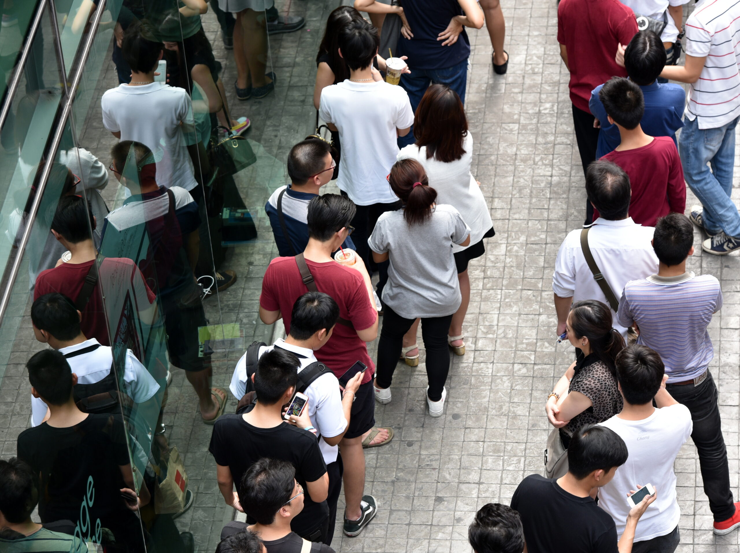 How long does the average Brit last in a shop queue?